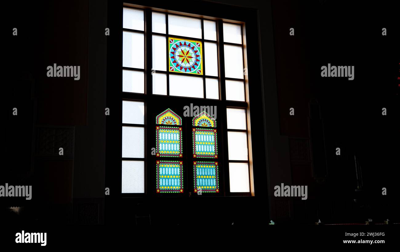 doha,qatar- february 02,2024: Sun light coming through the colorful ...