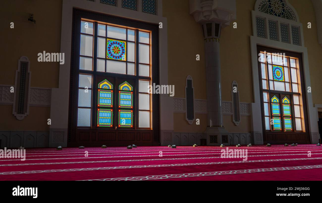 doha,qatar- february 02,2024: Sun light coming through the colorful ...