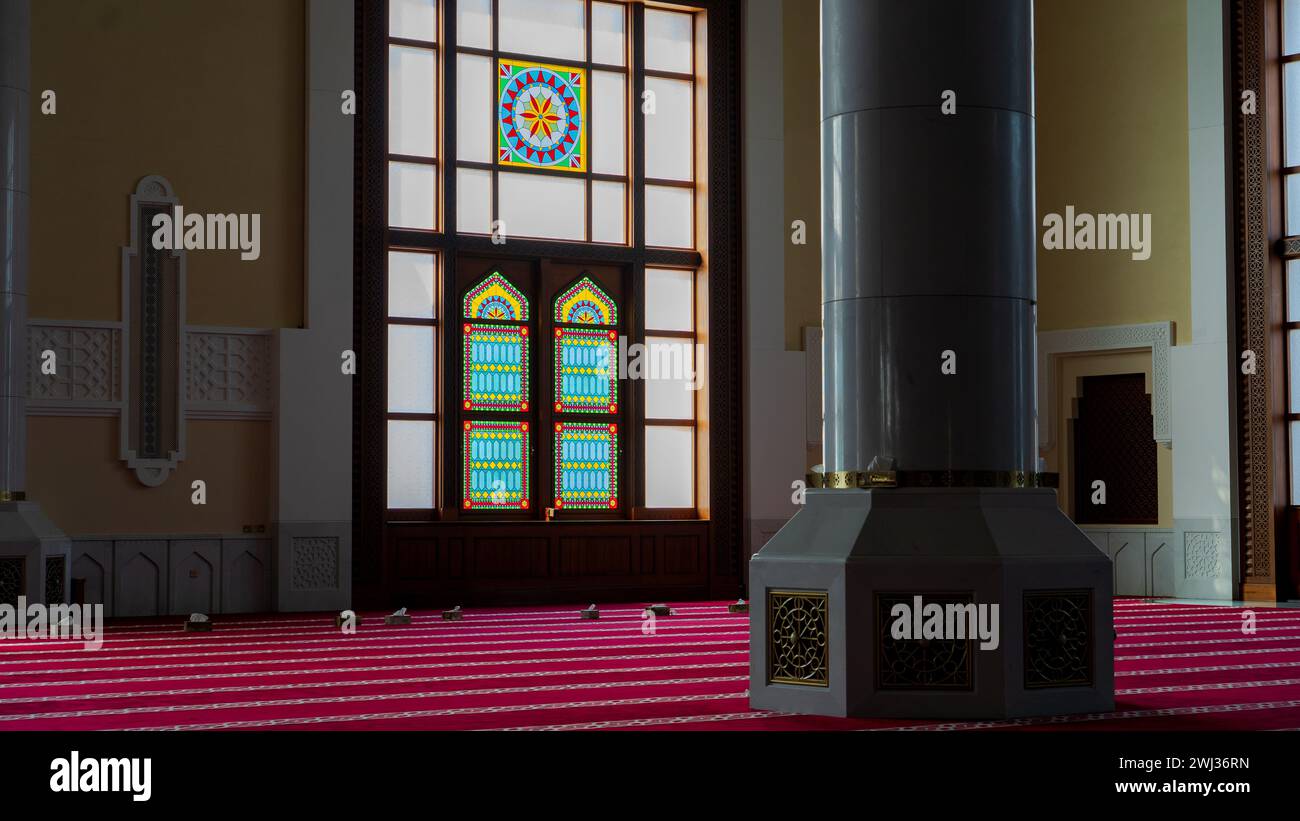 doha,qatar- february 02,2024: Sun light coming through the colorful ...