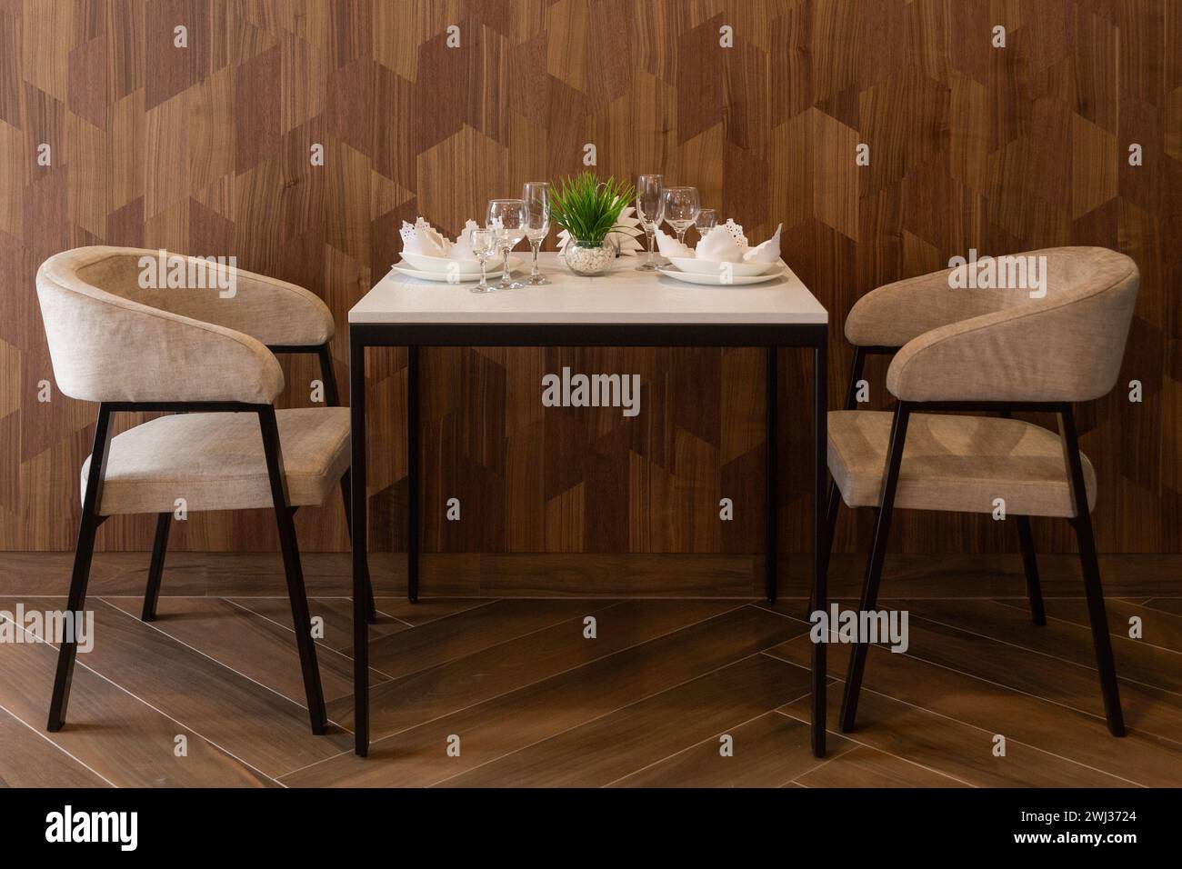 Table set up for two in a cafe, cafeteria, restaurant. Table and two ...