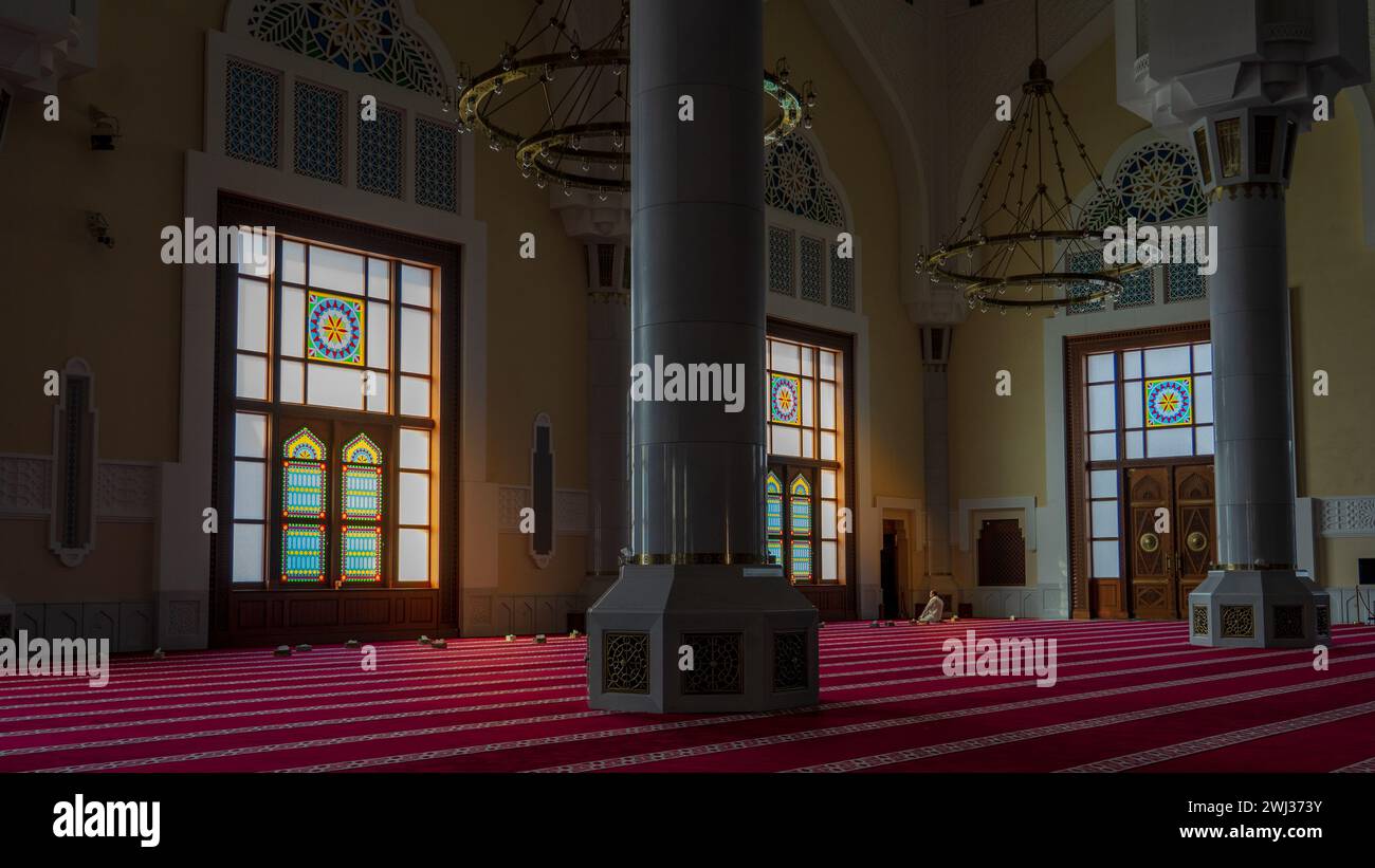 doha,qatar- february 02,2024: Sun light coming through the colorful ...