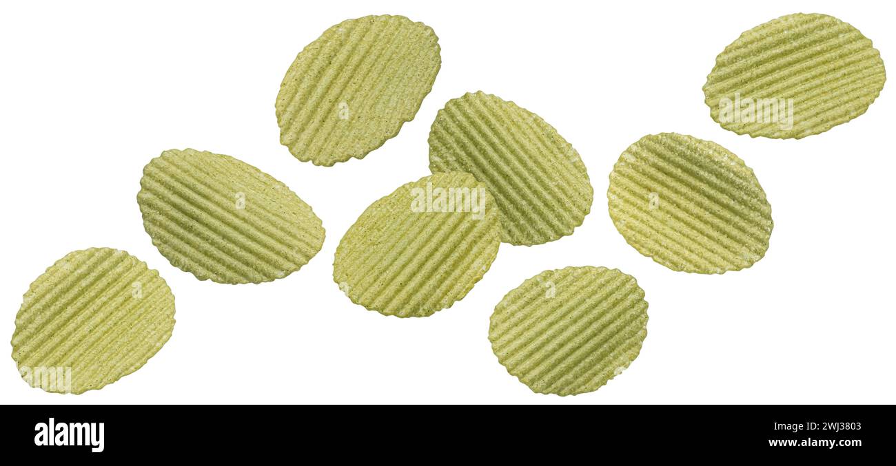 Falling green vegetable chips isolated on white background Stock Photo ...