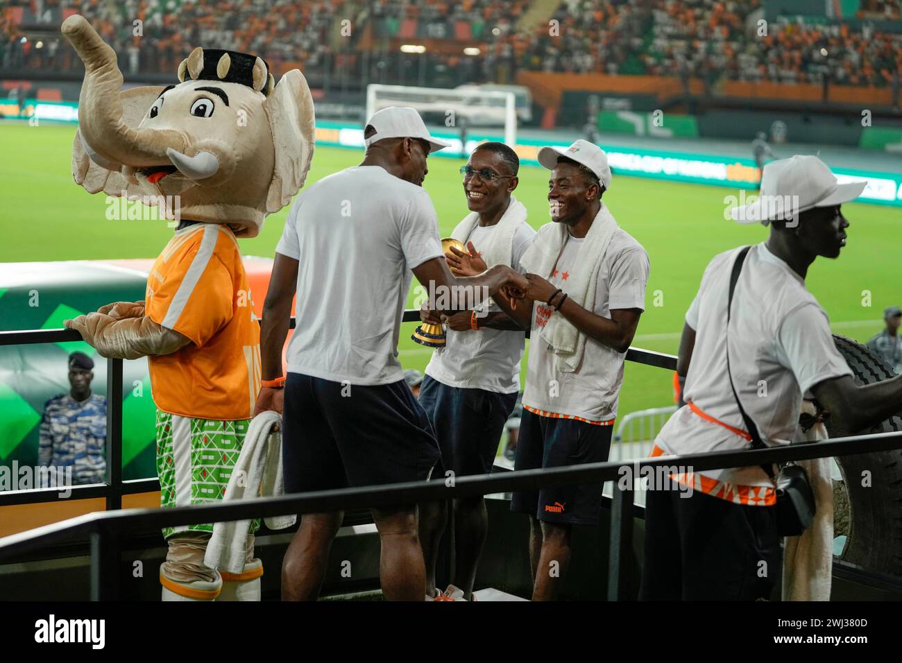 The Ivory Coast soccer team parades in front of supporters in the Felix ...