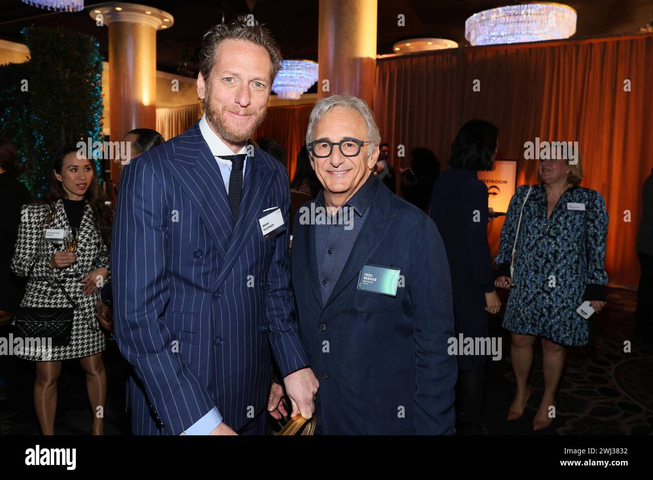 Brian Klugman, left, and Fred Berner attend the 96th Academy Awards ...