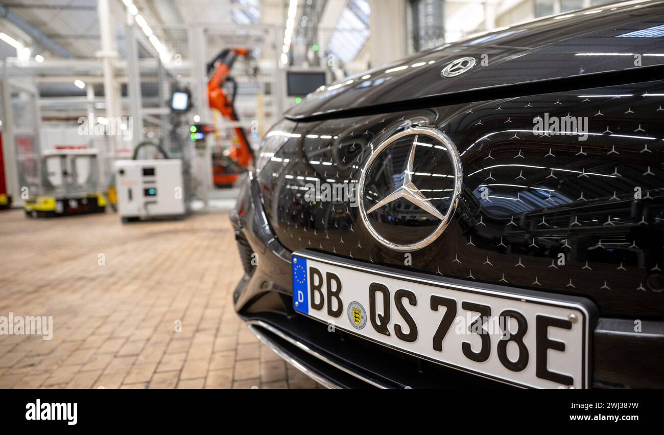 Berlin, Germany. 12th Feb, 2024. A Mercedes e-car is parked in a hall ...