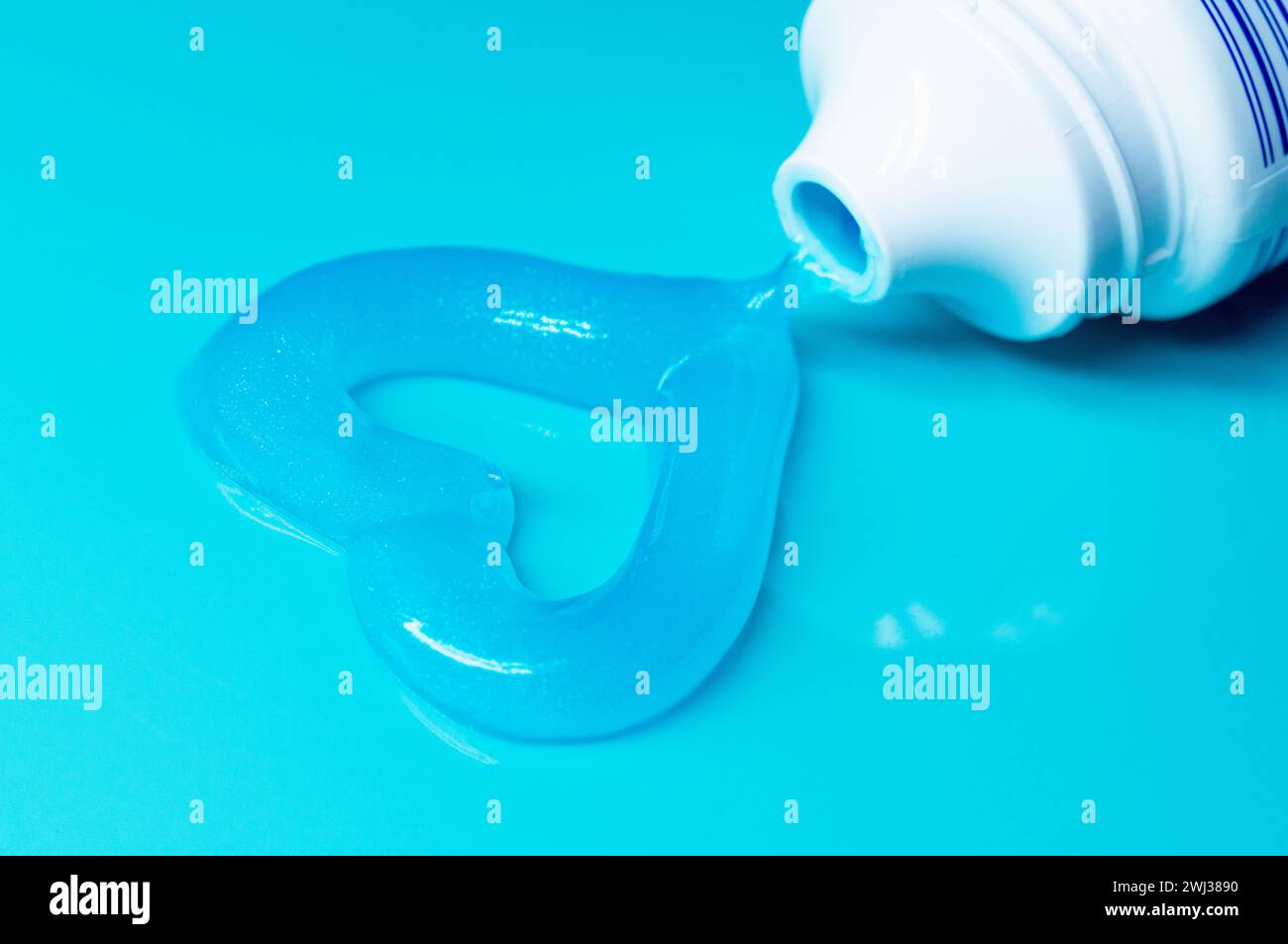 A heart made of blue toothpaste. gel toothpaste in a shape of a heart ...