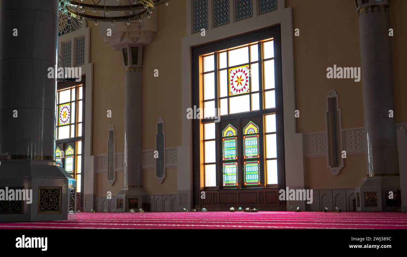 doha,qatar- february 02,2024: Sun light coming through the colorful ...