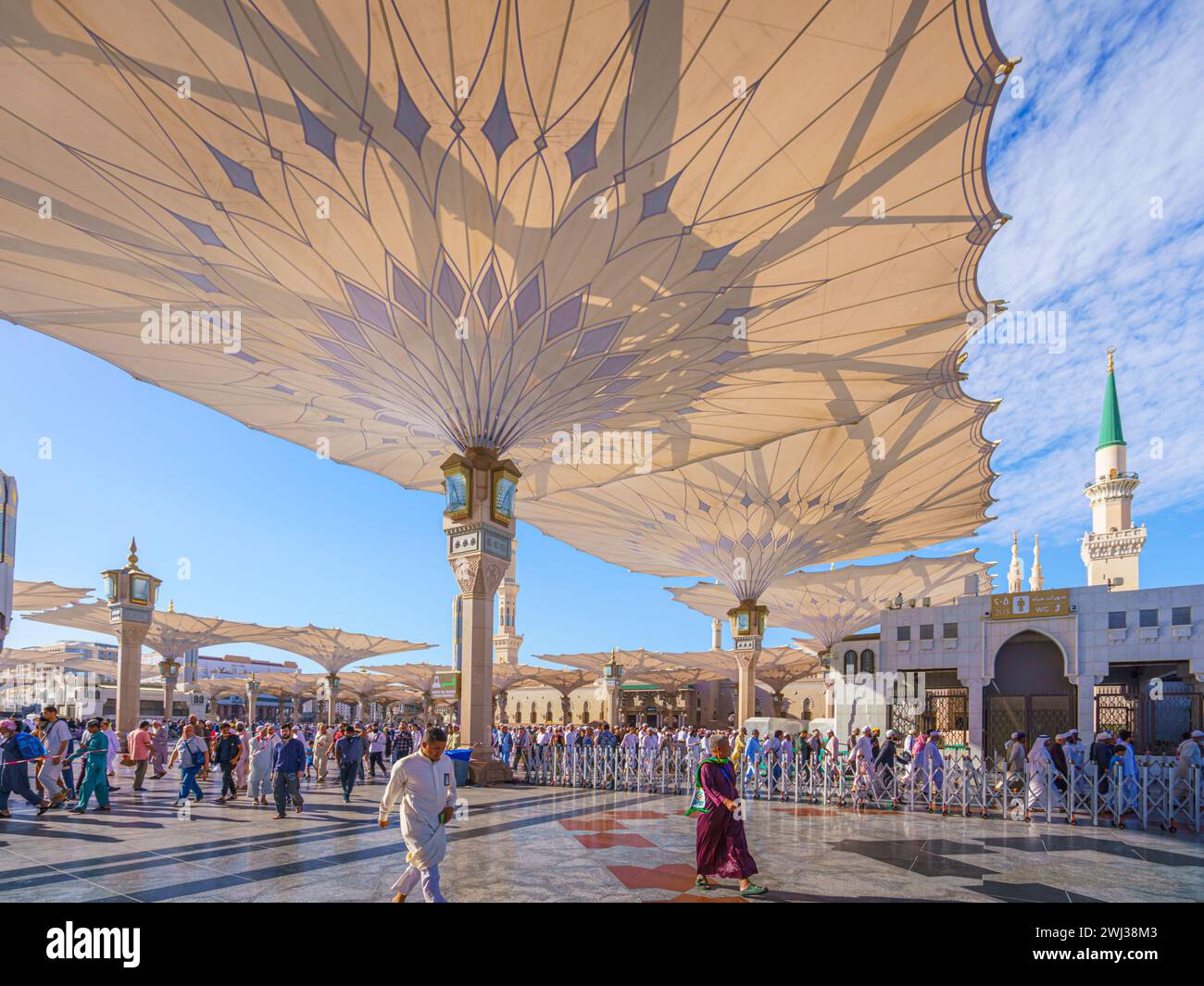 Al-Madinah al-Munawwarah - Mar 09 2023, Pilgrims walk through the main ...