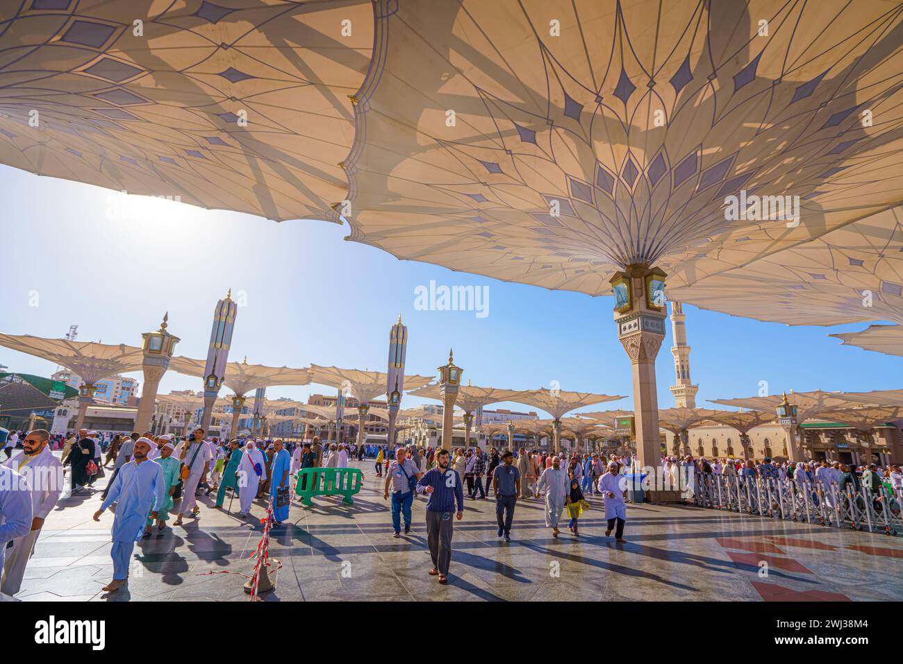 Al-Madinah al-Munawwarah - Mar 09 2023, Pilgrims walk through the main ...