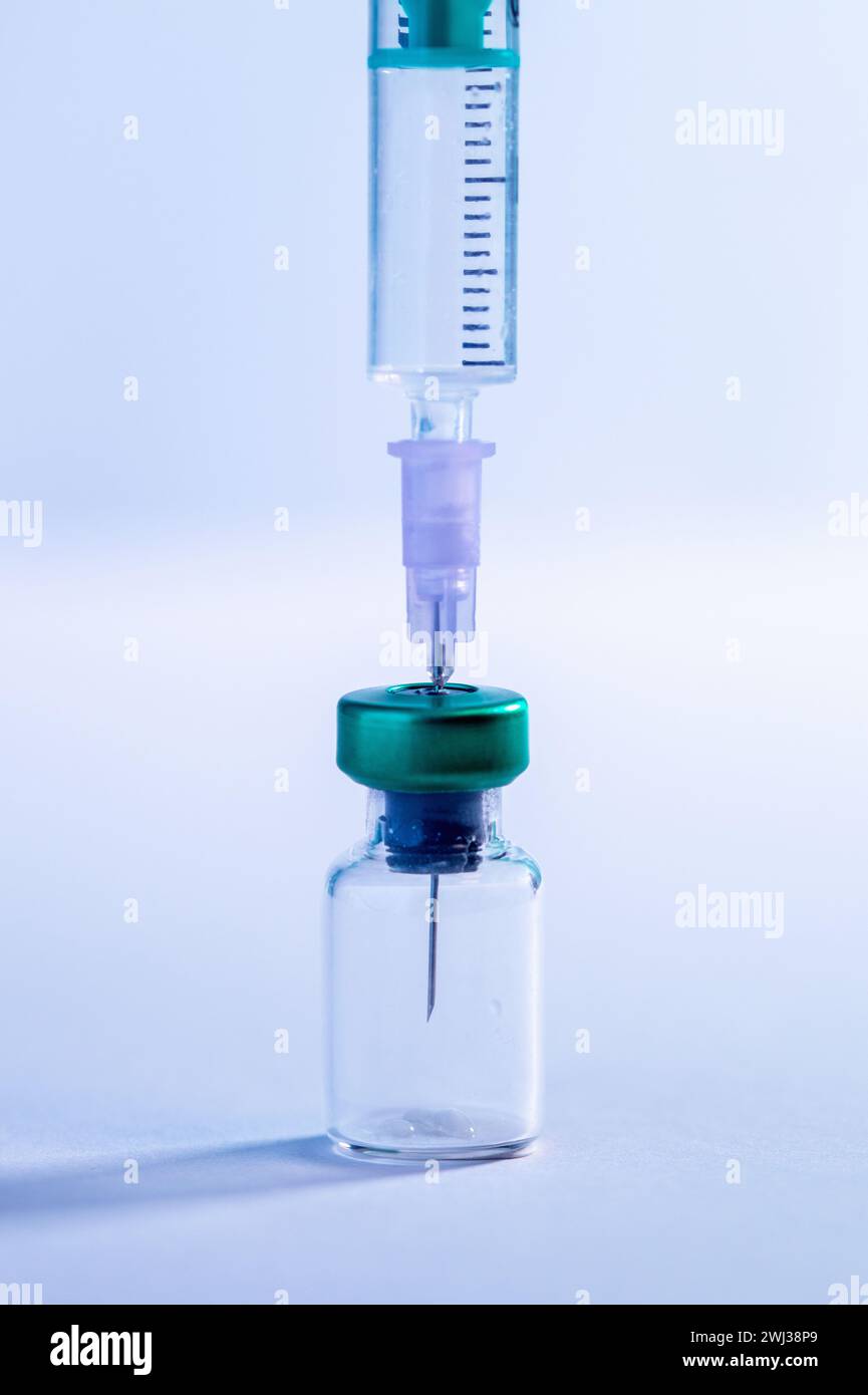 Pharmaceutical research. Syringe and vaccine. Research, Medicine ...