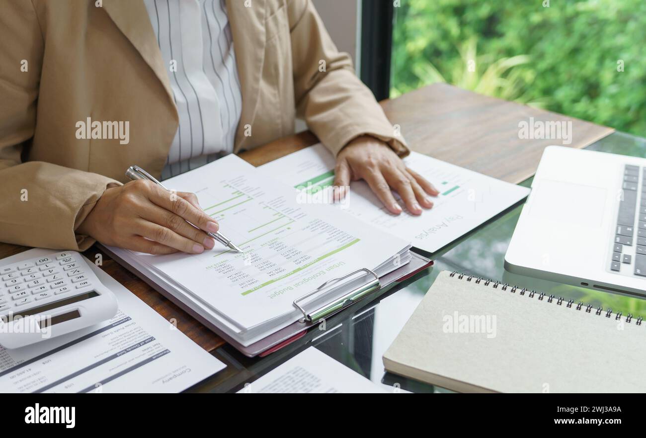 Business woman working in green eco friendly modern working space ...