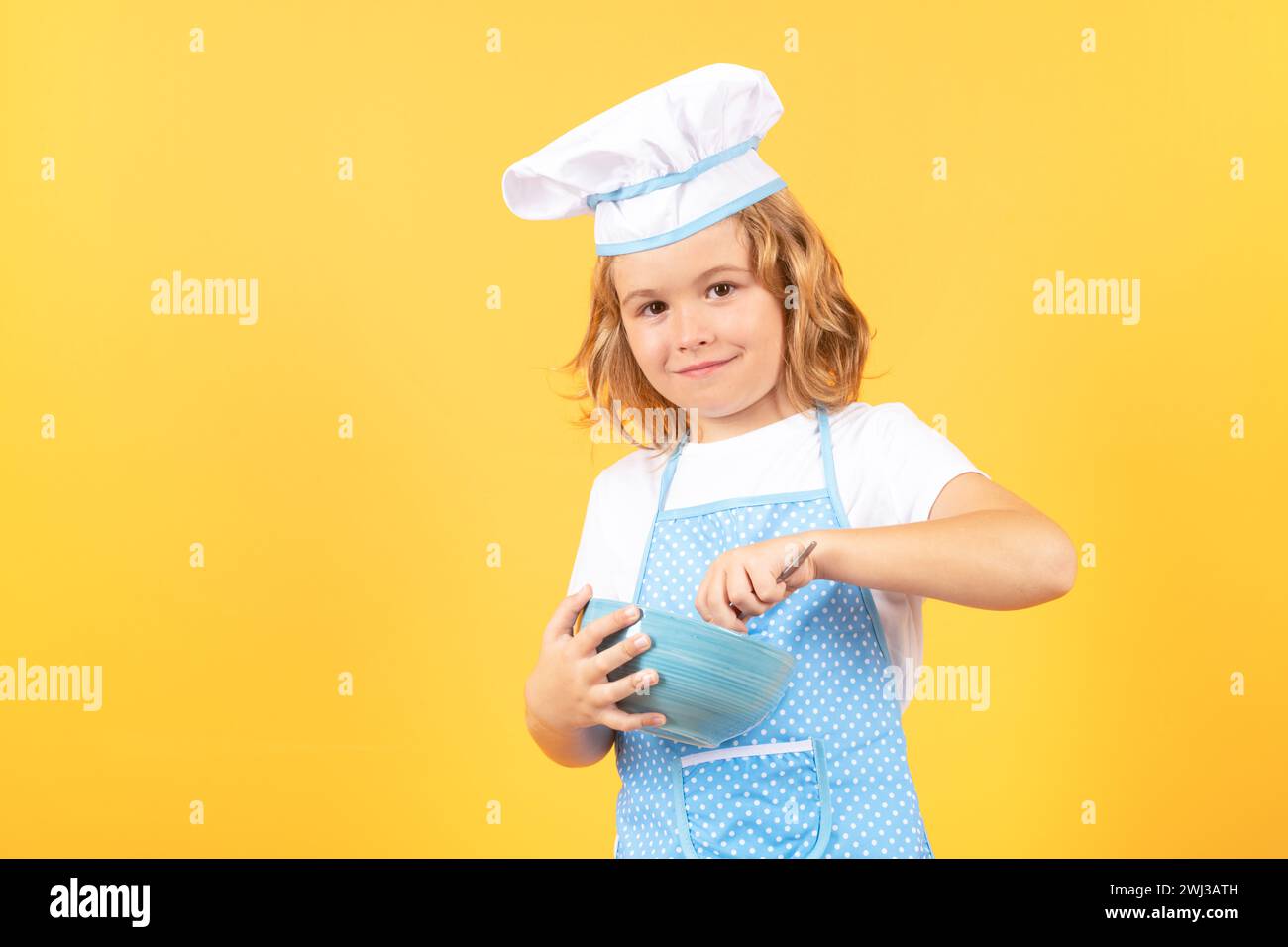 Kid chef cook with cooking bowl. Chef kid preparing healthy food ...