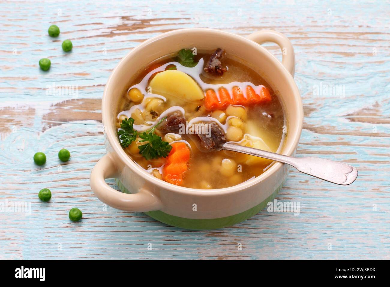 Yellow pea soup stew hi-res stock photography and images - Alamy
