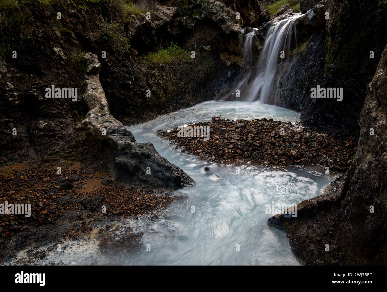 River with blue polluted water. Water contamination for copper mine ...