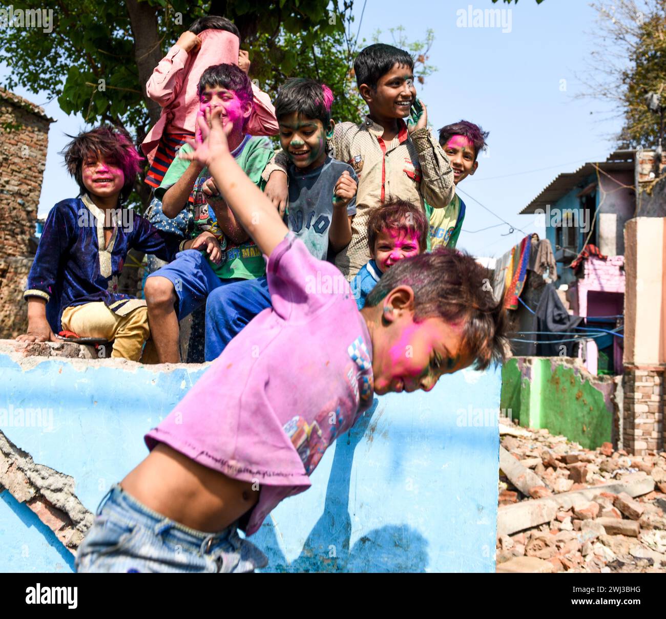 Indian asian children play wearing colorful clothes play happy outdoors ...