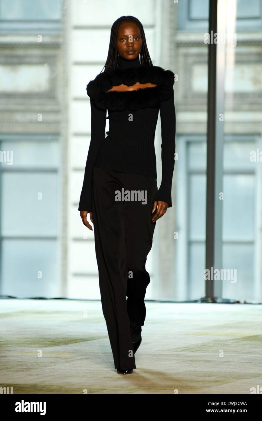 New York, USA. 12th Feb, 2024. Models walk the runway at the Aknvas ...