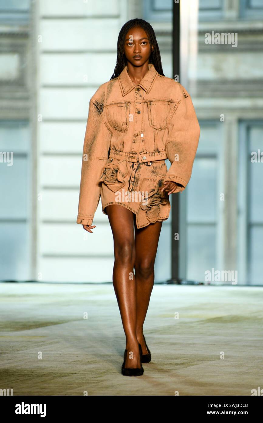New York, USA. 12th Feb, 2024. Models walk the runway at the Aknvas ...