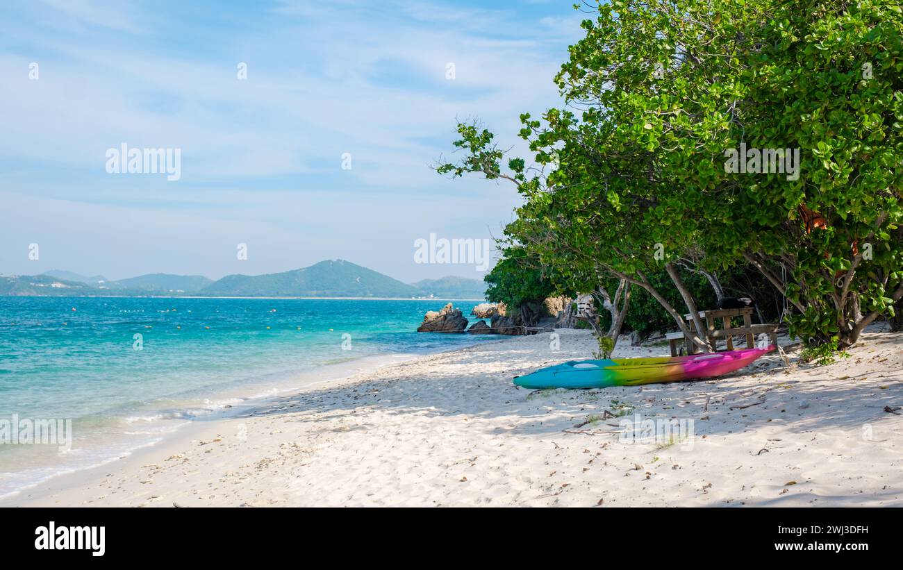 A colorful kayak on the beach of Ko Kham Island Sattahip Chonburi ...