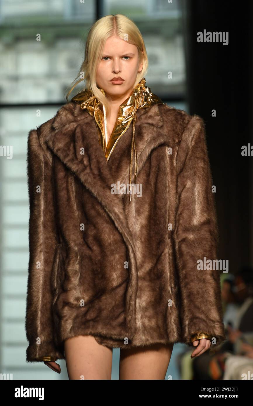 New York, USA. 12th Feb, 2024. Models walk the runway at the Aknvas ...