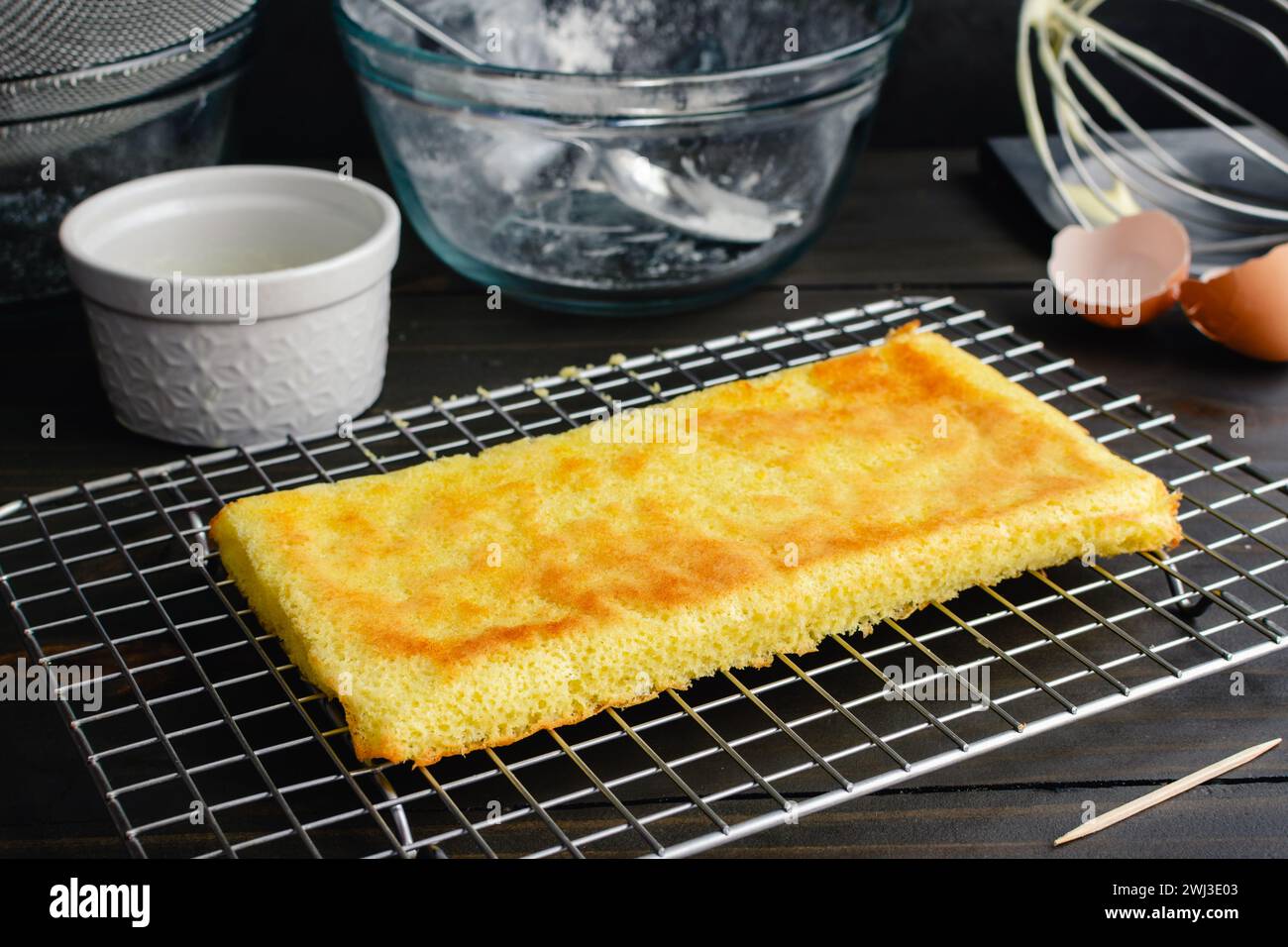 Thin Sponge Cake Cooling on a Wire Rack: Rectangular cake on a cooling ...
