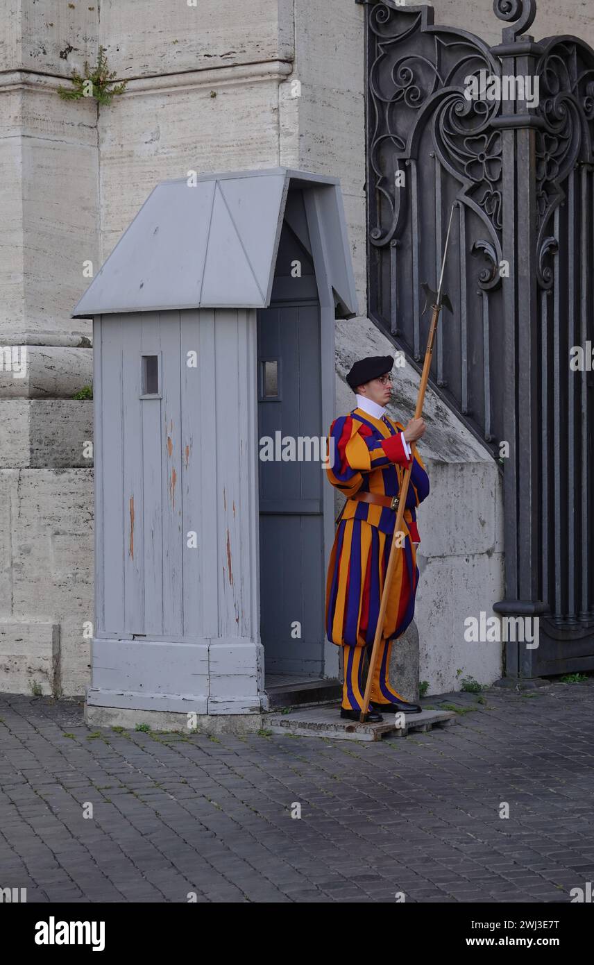 A member of the Pontifical Swiss Guard on duty at the Vatican Italy ...