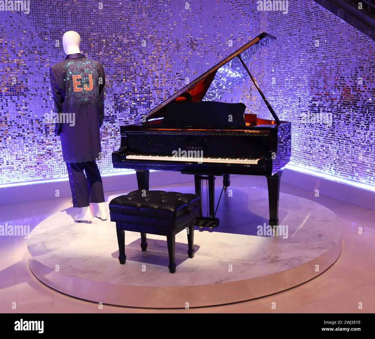 New York, New York, USA. 12th Feb, 2024. (L) Purple Rhinestone suit ...