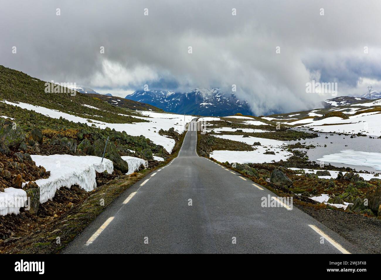 Great asphalt Snow Road Stock Photo - Alamy