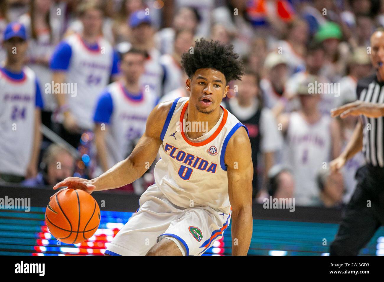 Florida guard Zyon Pullin (0) drives during the first half of an NCAA college basketball game ...