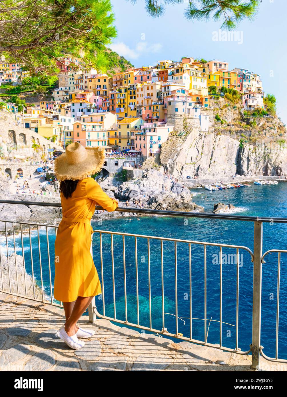 Asian women visiting Manarola in Cinque Terre Italy Stock Photo - Alamy