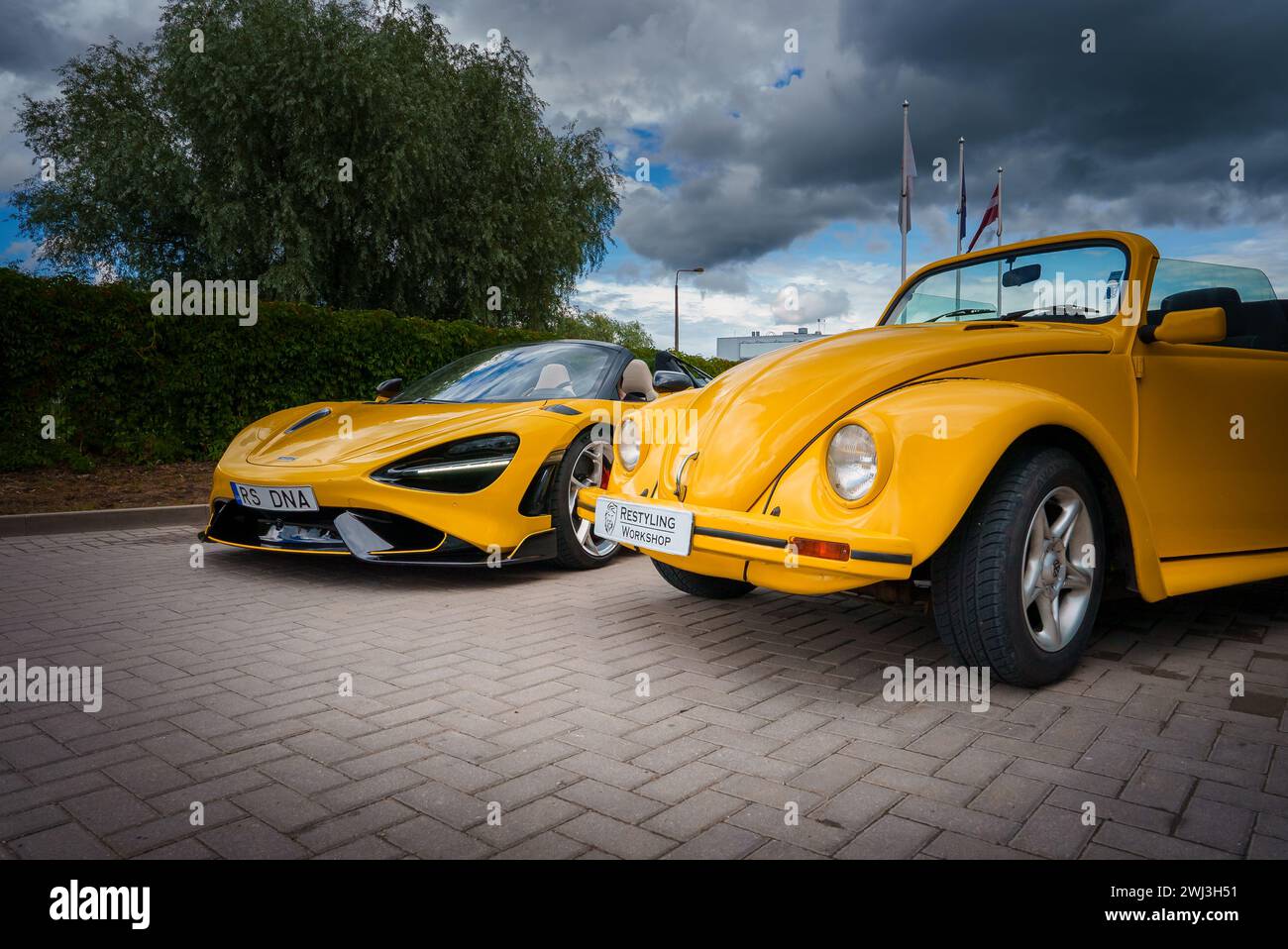 Yellow McLaren 765LT, VW Beetle Parked Beneath a Partly Cloudy Sky ...