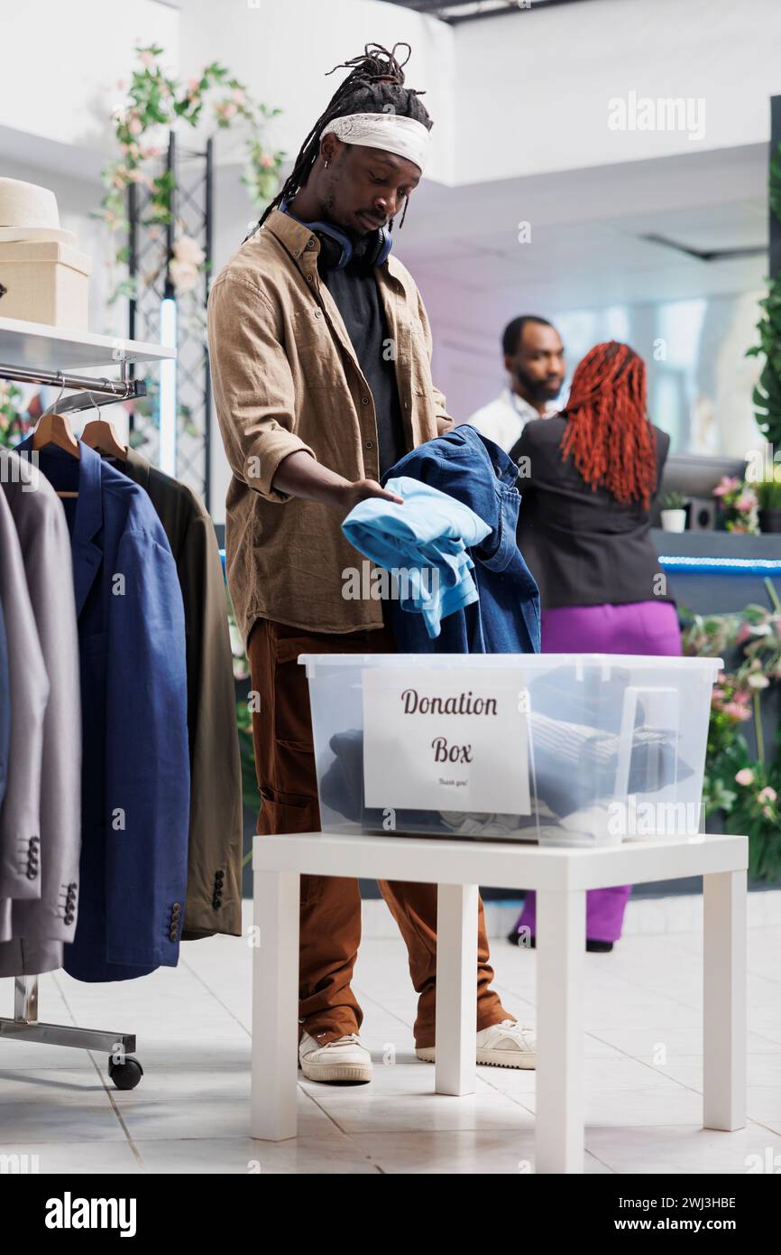 Person in charity shop donating hi-res stock photography and images - Alamy