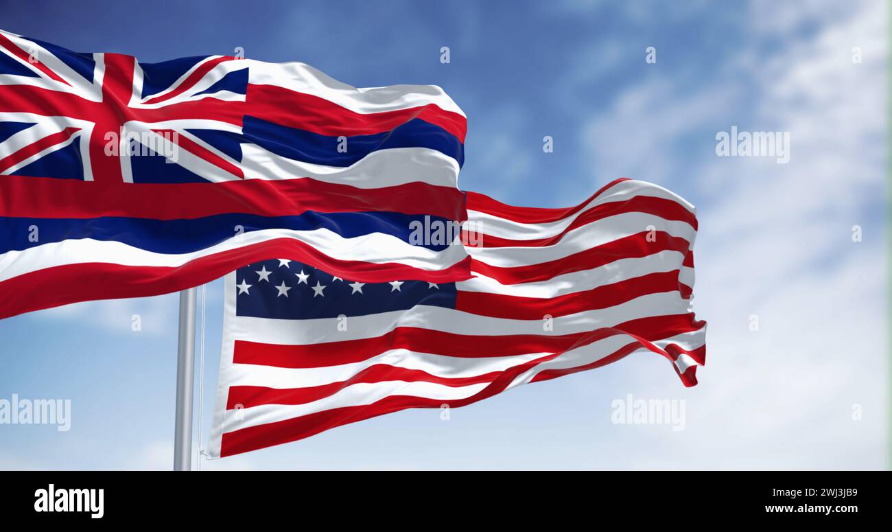 Hawaii state flag waving with the national flag of the United States of ...