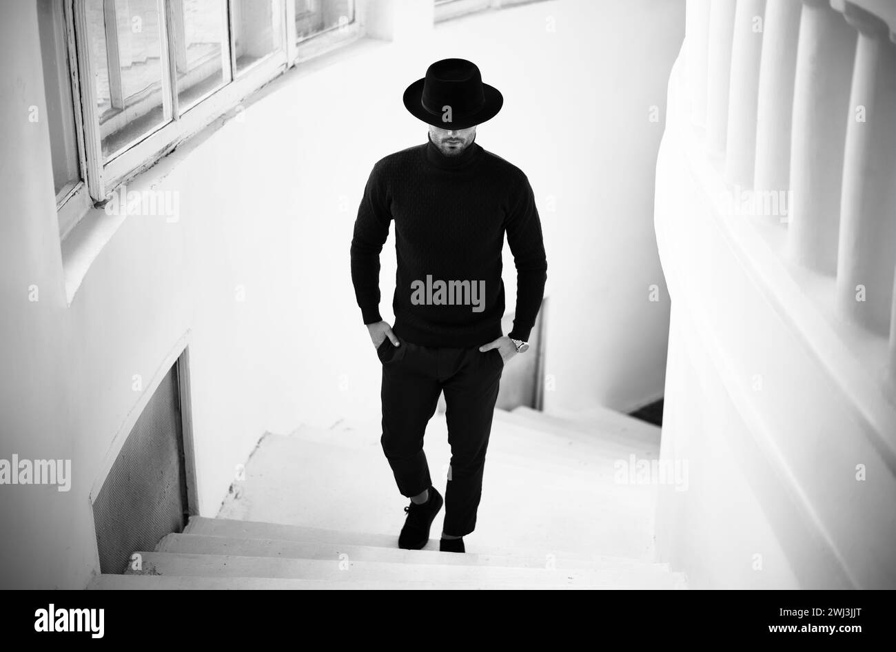 Man with hat covering face hi-res stock photography and images - Alamy