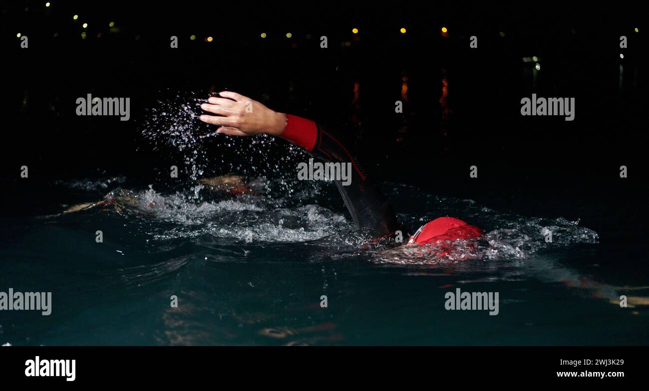 A determined professional triathlete undergoes rigorous night time ...