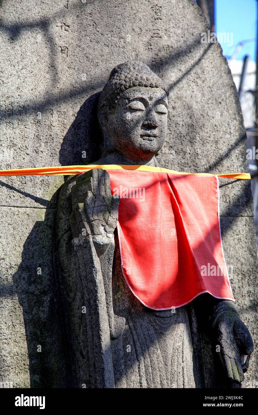A stone statue of Buddha at the Senso-ji Temple in Asakusa in Tokyo ...