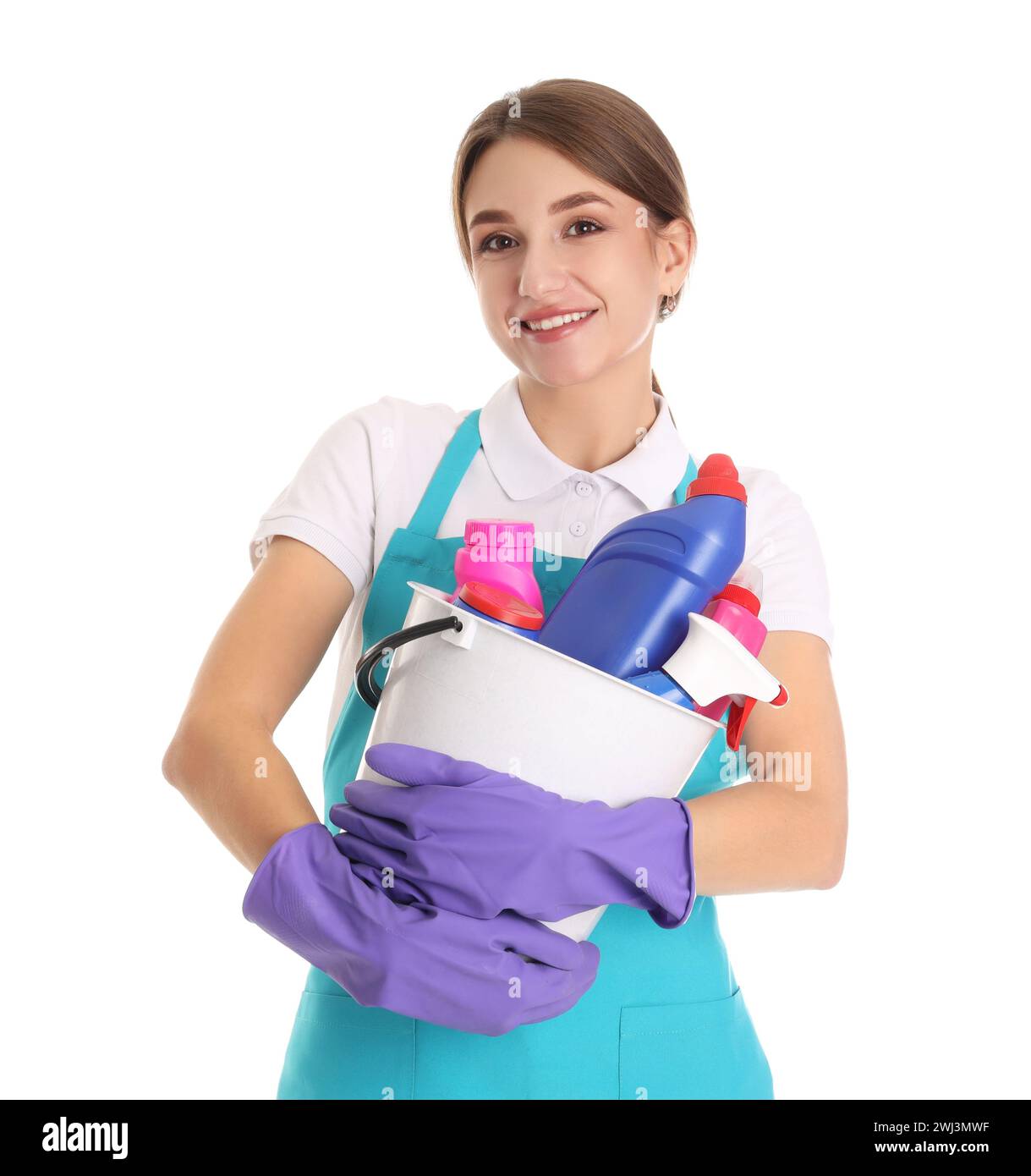 Female janitor with bucket of cleaning supplies on white background ...