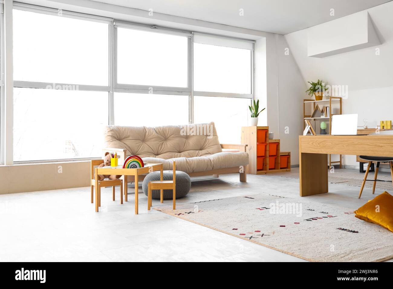 Interior of child psychologist's office with sofa and tables Stock ...