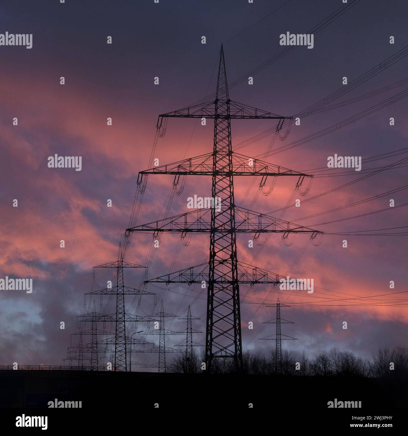 Silhouette electricity pylons power hi-res stock photography and images ...