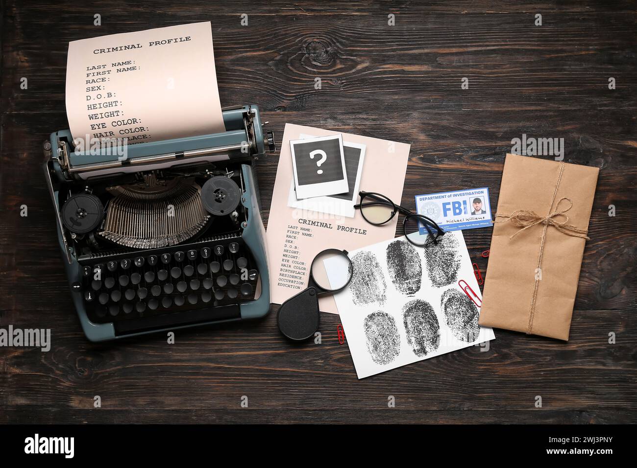 Composition with retro typewriter, criminal files and document of FBI ...