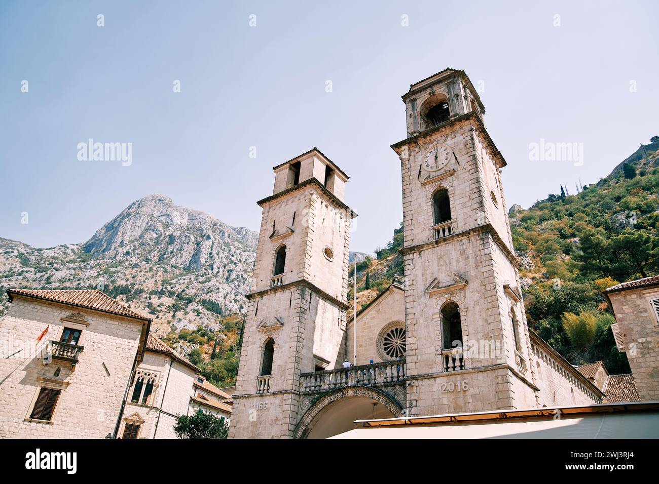Bell towers of the Cathedral of St. Tryphon among ancient houses at the ...