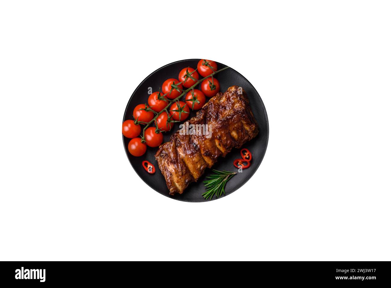 Delicious grilled pork ribs with sauce, spices and herbs Stock Photo ...