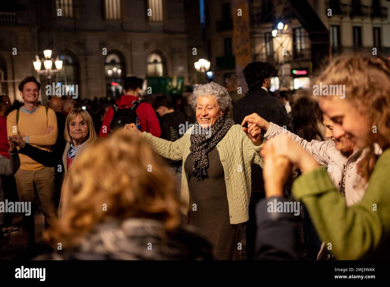 February 12, 2024, Barcelona, Spain: In downtown Barcelona women dance ...