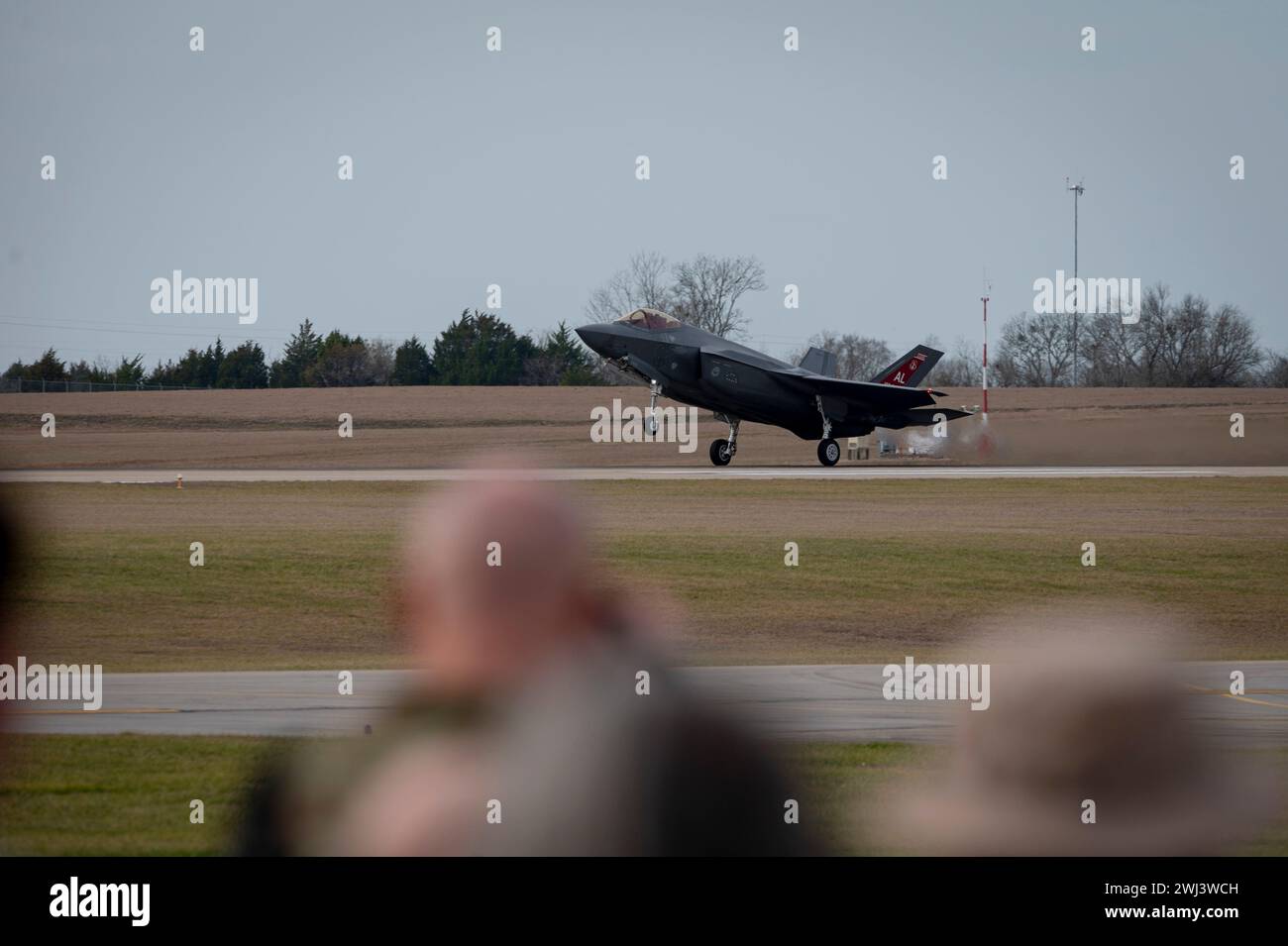 An F-35 Lightning II touches down after a flyover that signaled its ...