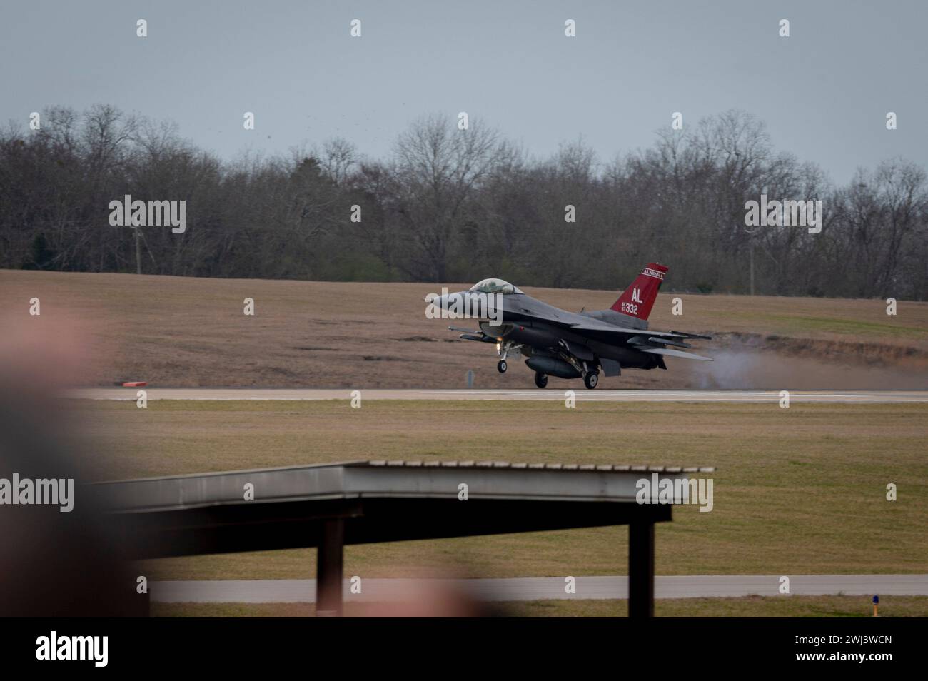 An F-16 Falcon touches down after a flyover that signaled the arrival ...