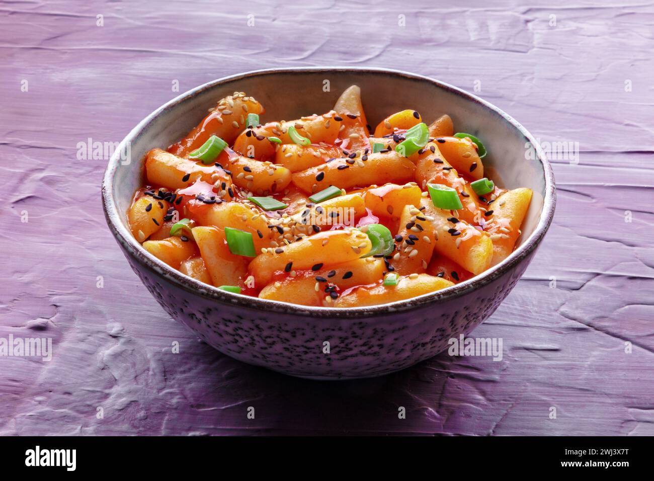 Tteokbokki or topokki, Korean street food, spicy rice cakes Stock Photo ...