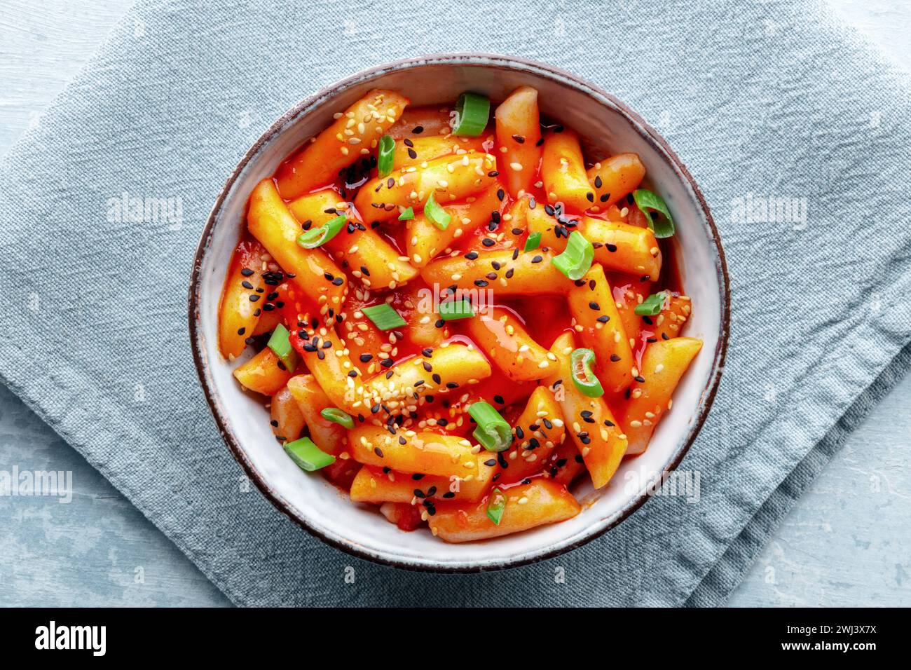 Tteokbokki or topokki, Korean street food, spicy rice cakes Stock Photo ...