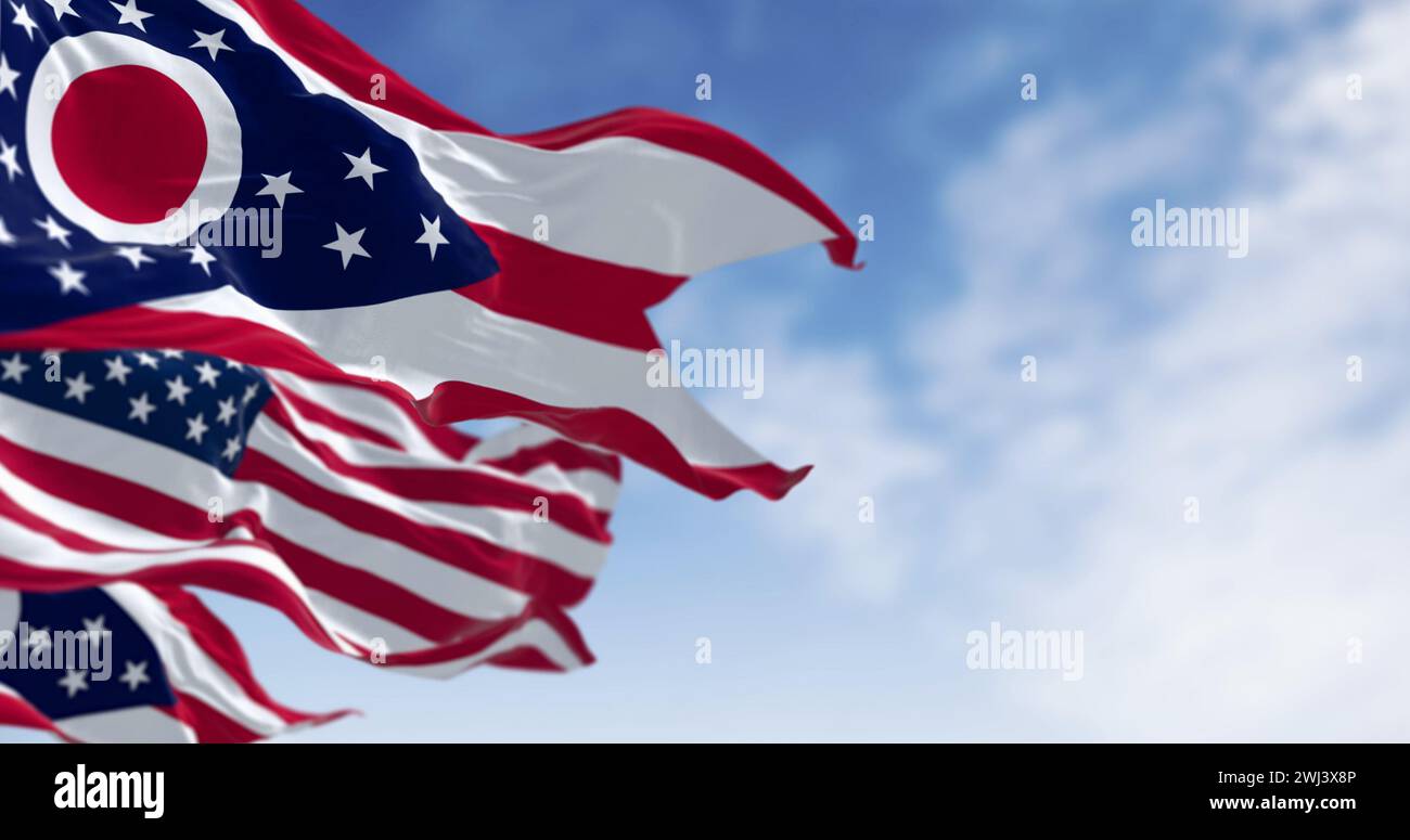 The Ohio state flag waving along with the national flag of the US Stock ...