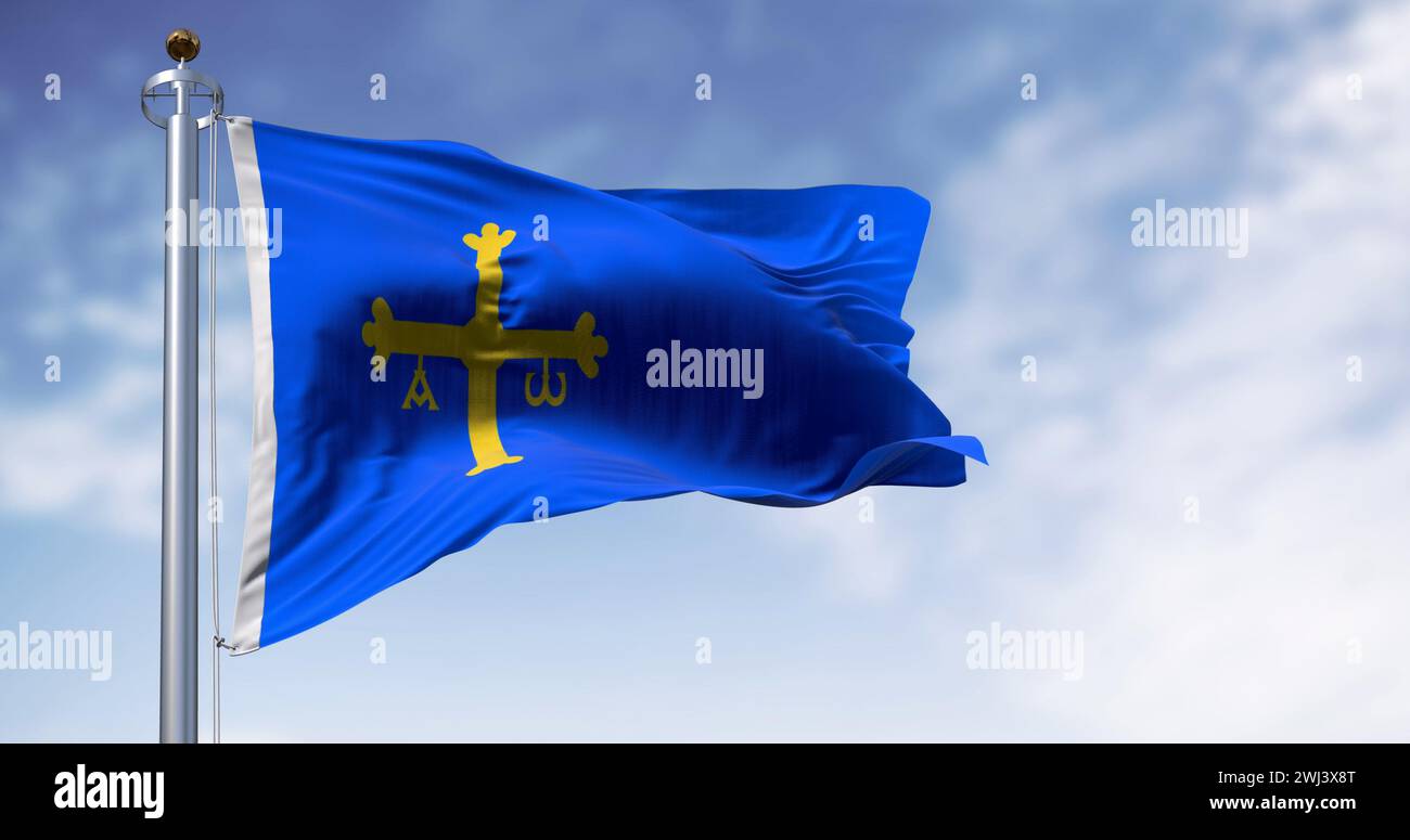 The Asturias flag waving in the wind on a clear day Stock Photo - Alamy
