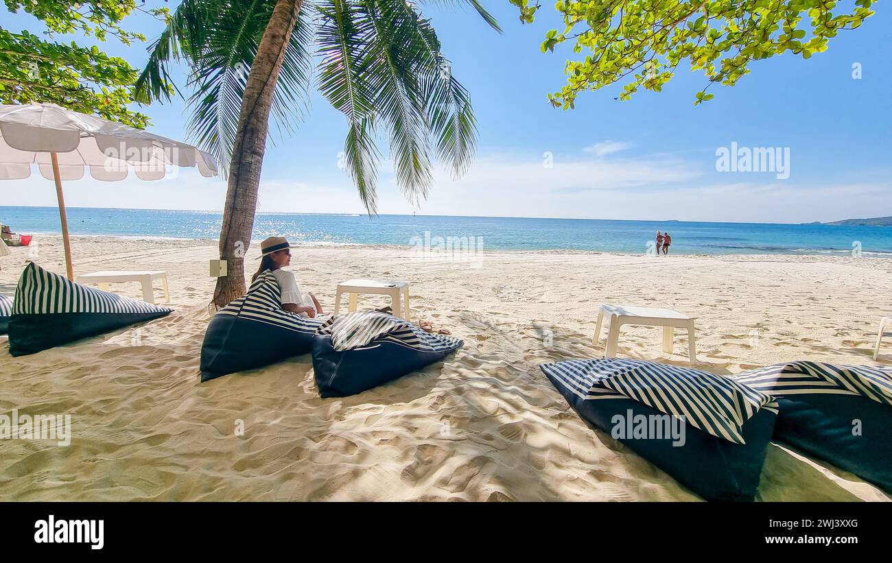 Asian woman on a beach chair on the beach of Koh Samet Island Rayong ...