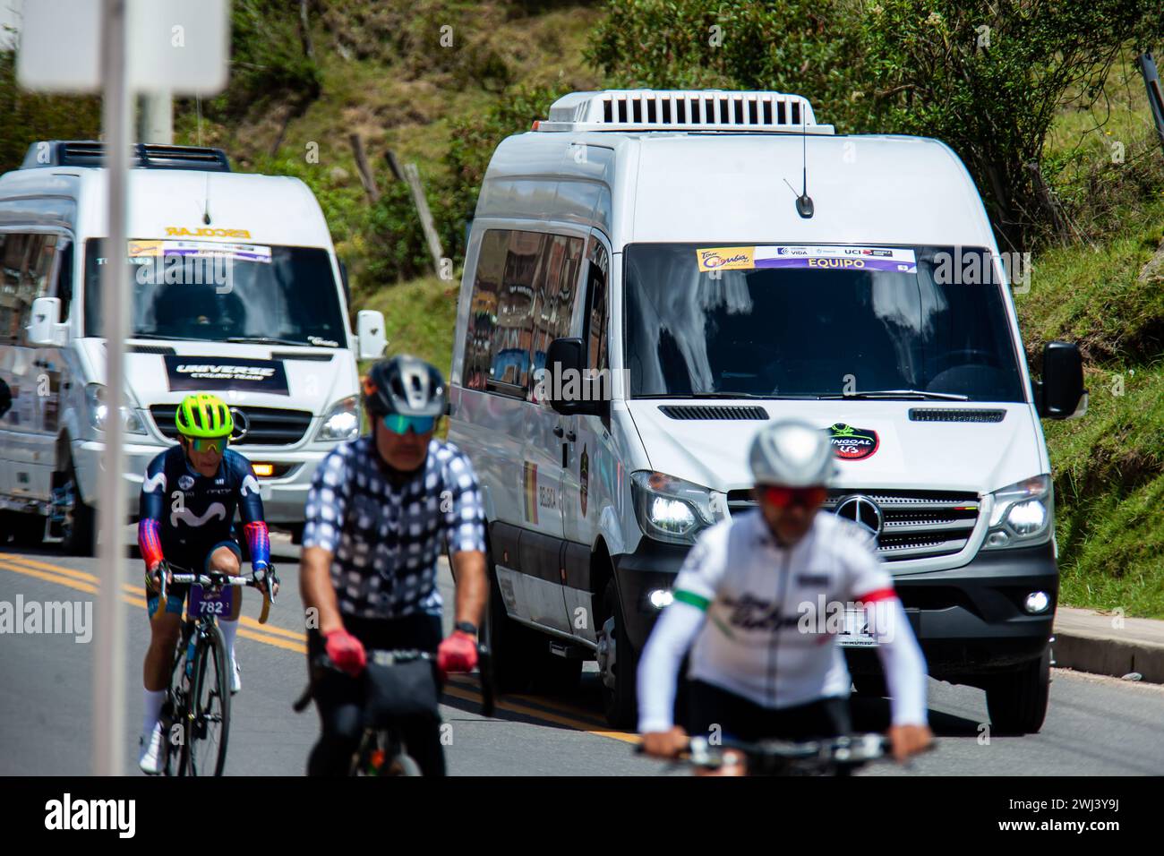 LA CALERA, COLOMBIA - FEBRUARY 11, 2024: Team accompanying vehicle ...